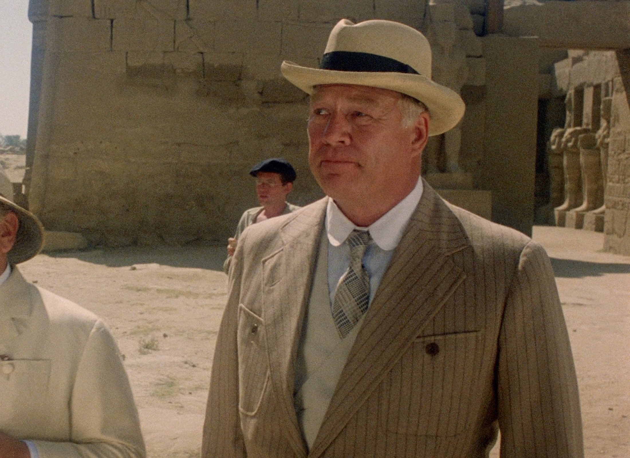 Death on the Nile: George Kennedy's Brown Striped Sport Jacket » BAMF Style